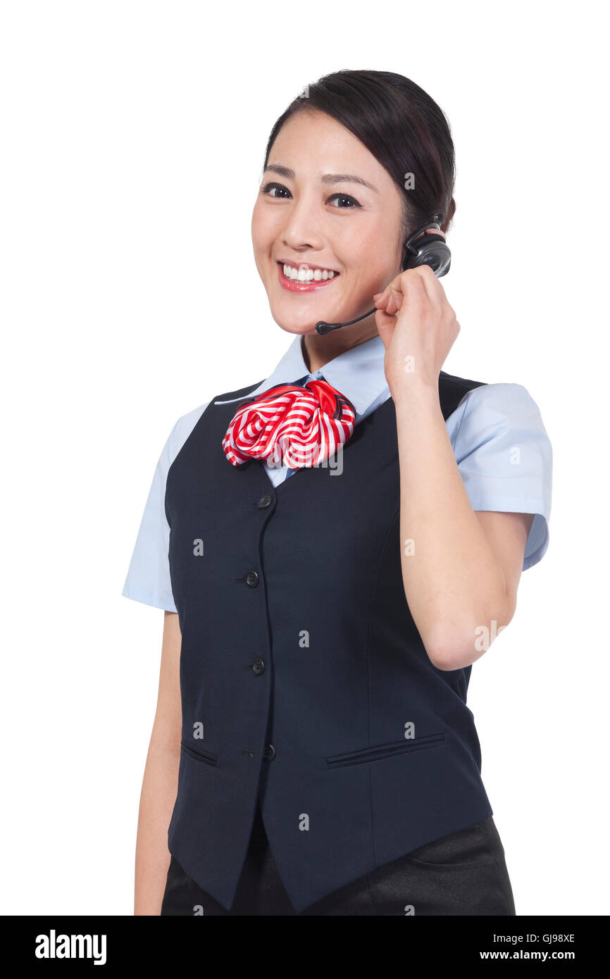 Studio shot young female attendant at work Stock Photo - Alamy