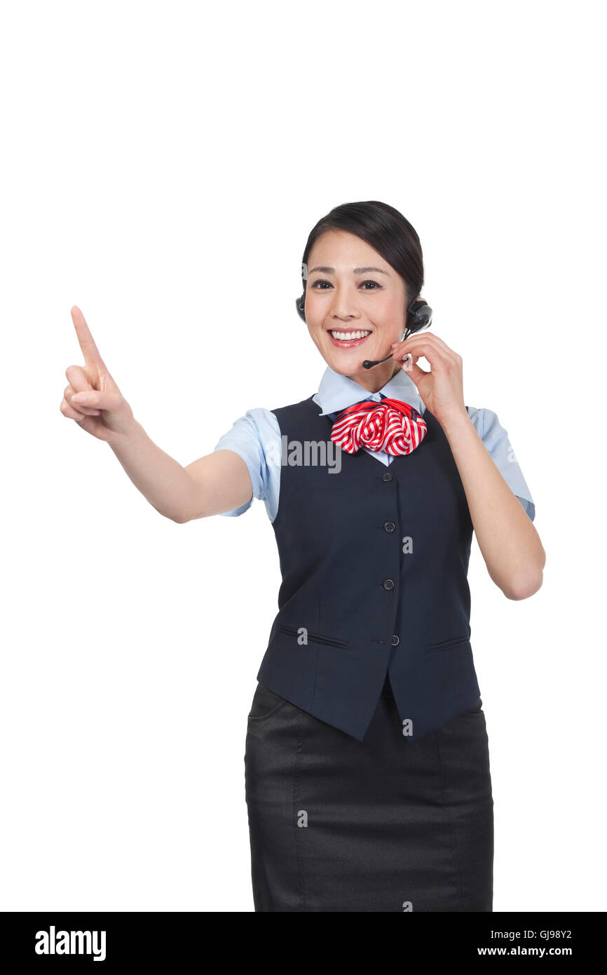 Studio shot young female attendant at work Stock Photo - Alamy