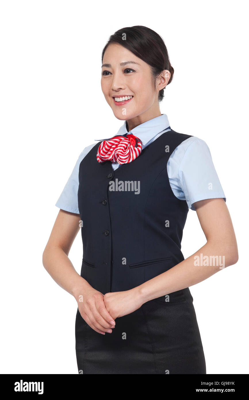 Studio shot Young waitress Stock Photo - Alamy