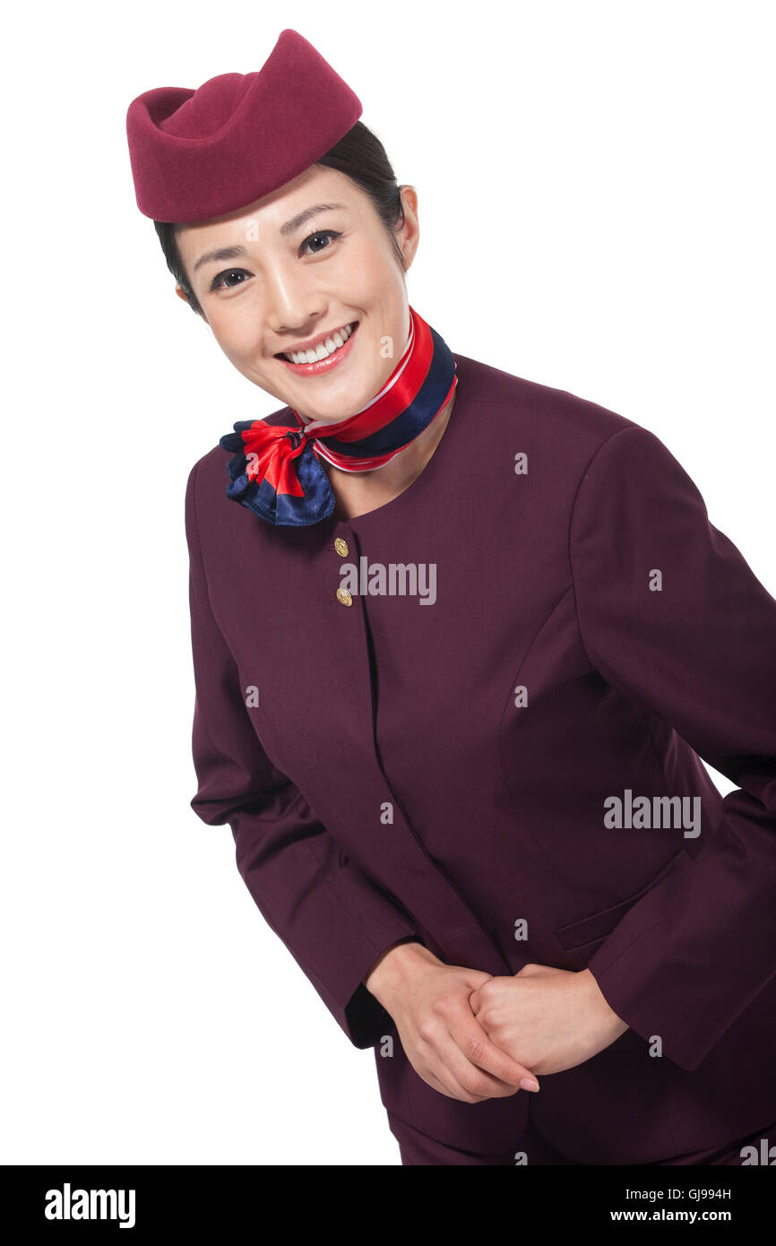 Studio shot Young waitress Stock Photo - Alamy