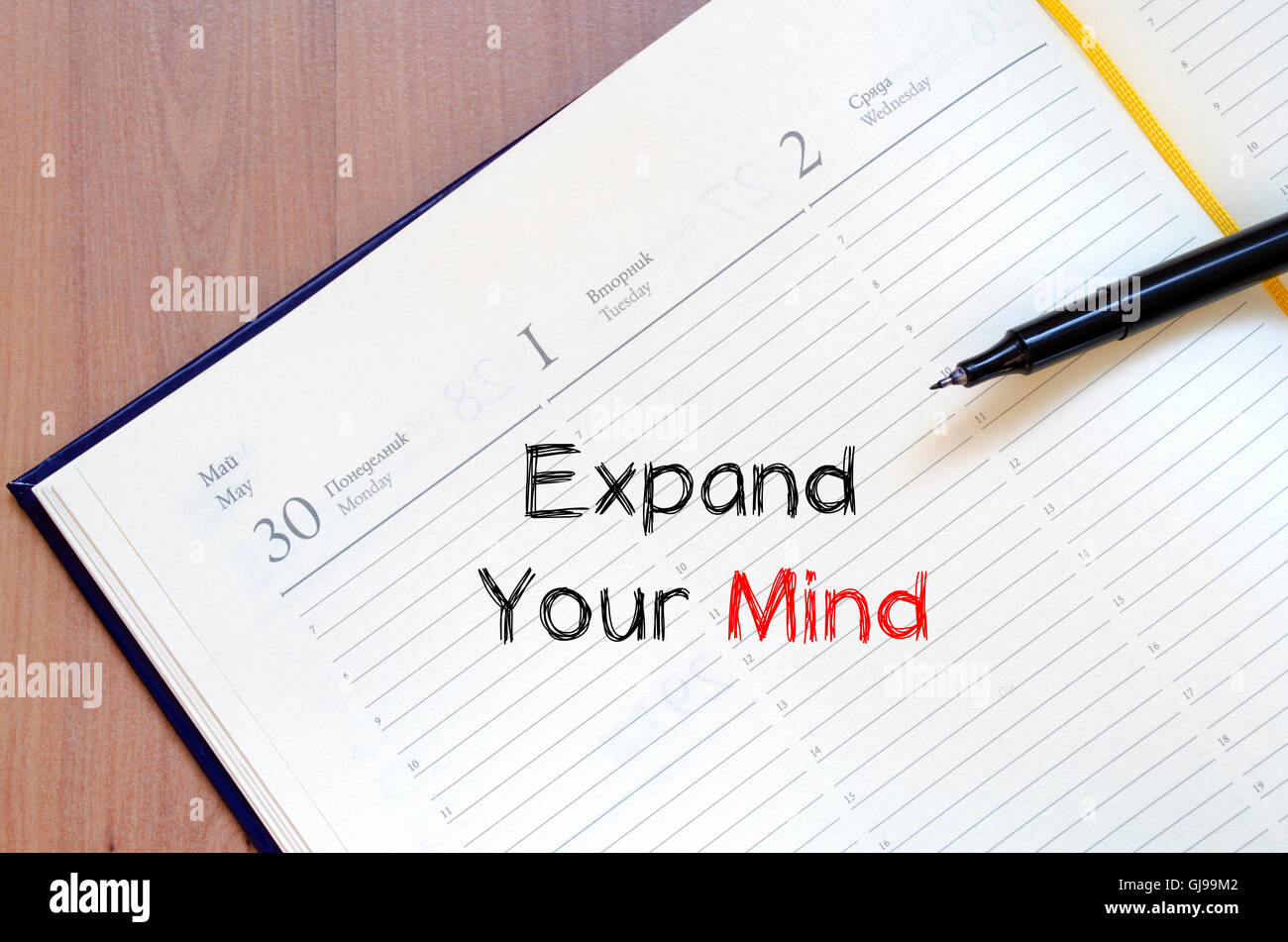 Expand your mind text concept write on notebook Stock Photo - Alamy