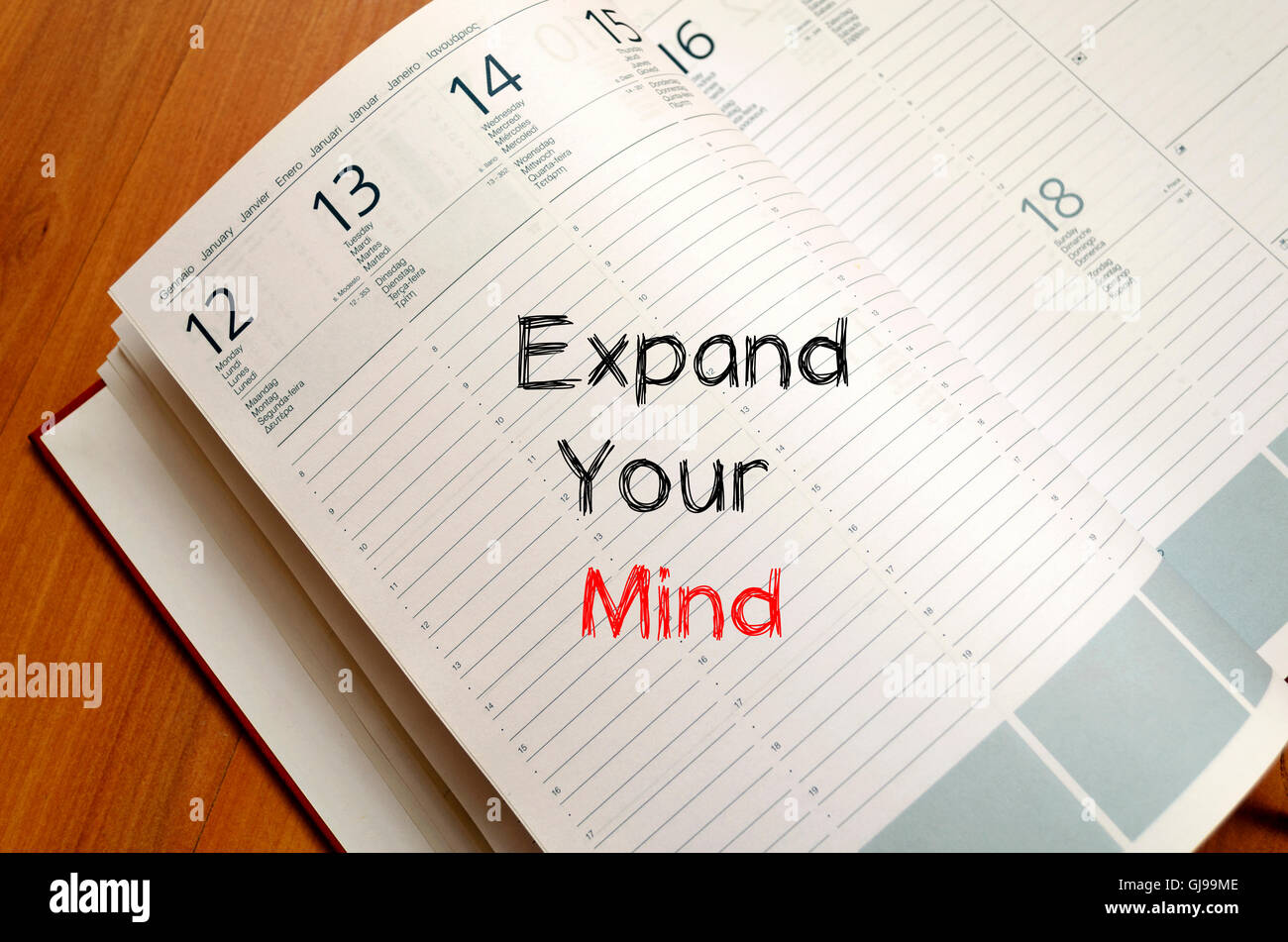 Expand your mind text concept write on notebook Stock Photo - Alamy