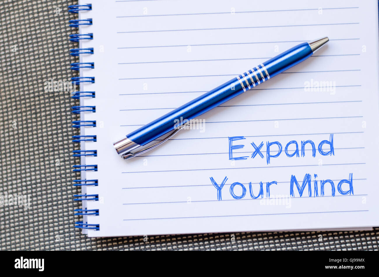 Expand your mind text concept write on notebook Stock Photo - Alamy