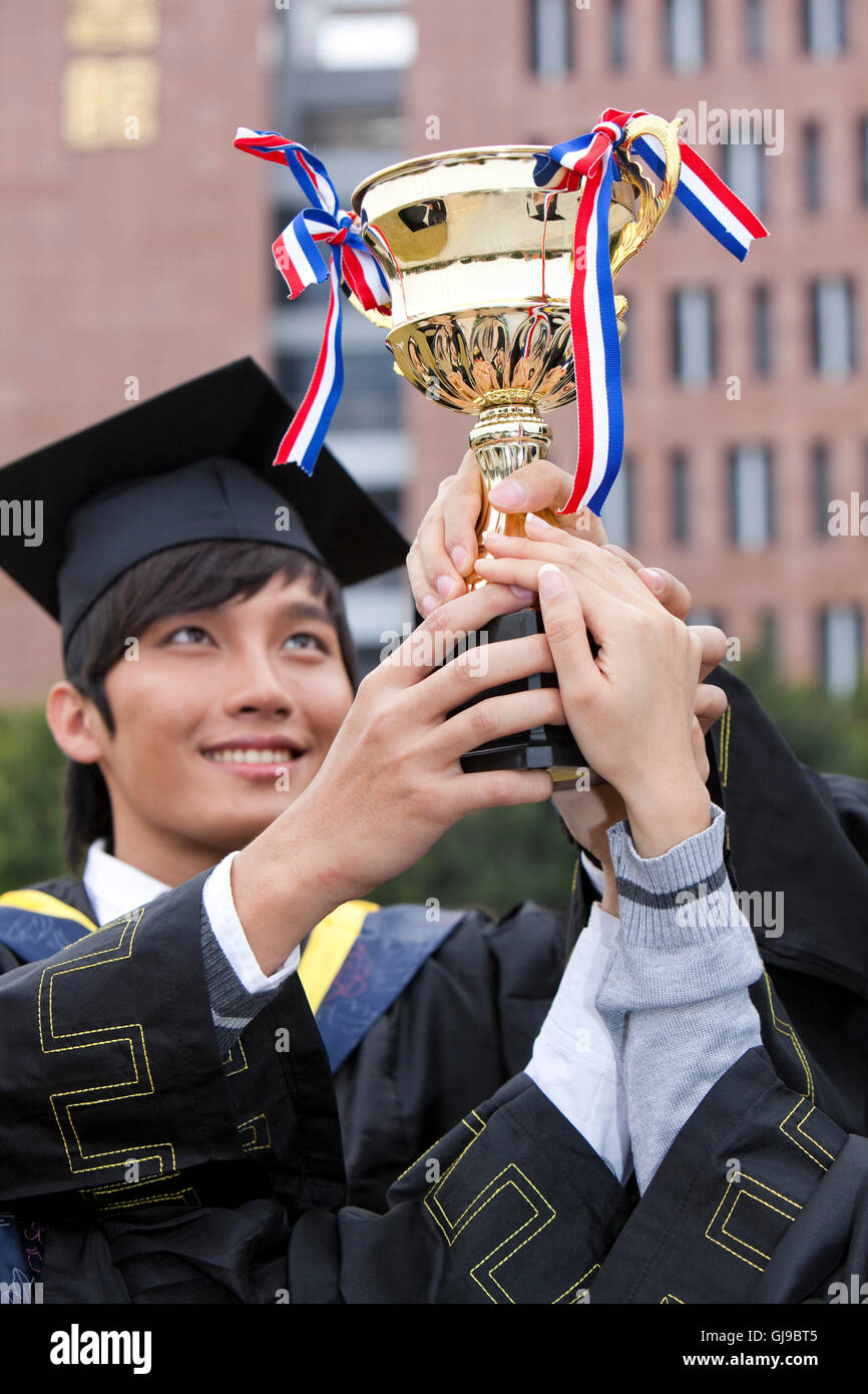 Young university student graduation ceremony on campus Stock Photo - Alamy