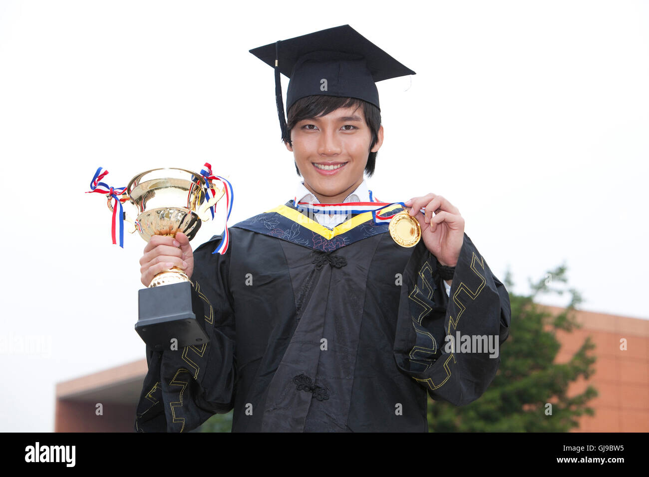 Young university student graduation ceremony on campus Stock Photo - Alamy