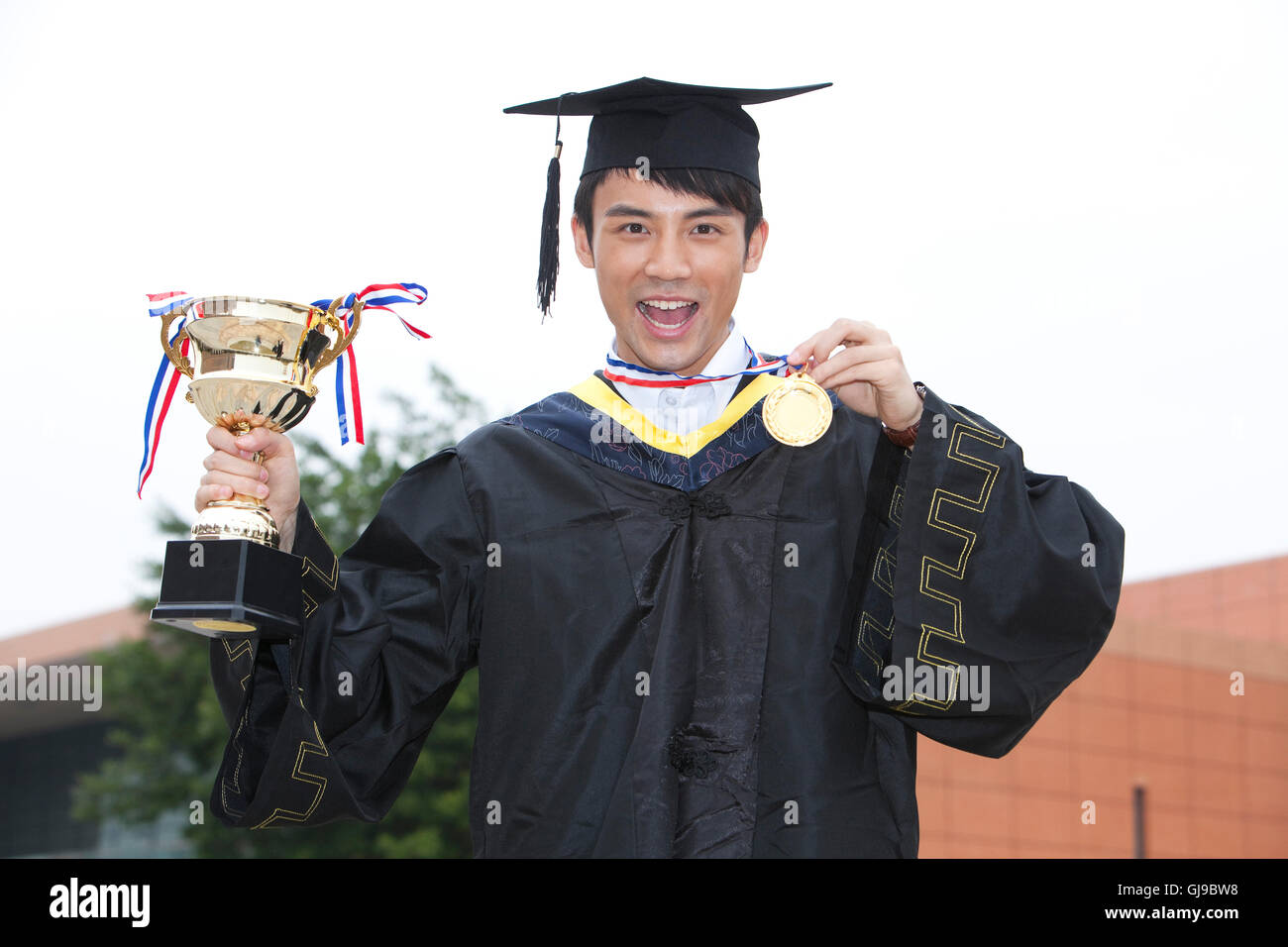 Young university student graduation ceremony on campus Stock Photo - Alamy