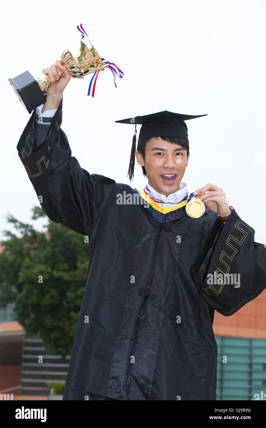 Young university student graduation ceremony on campus Stock Photo - Alamy