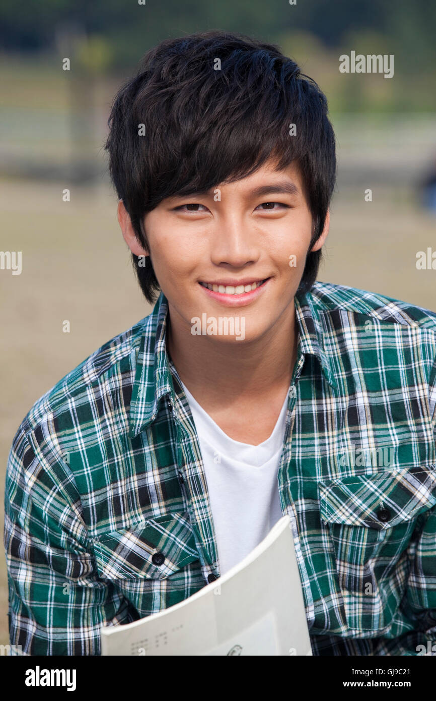 Young college students in a park outing Stock Photo - Alamy