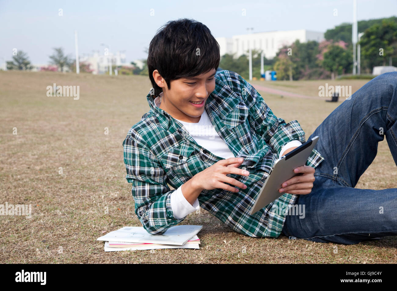 Young college students in a park outing Stock Photo - Alamy