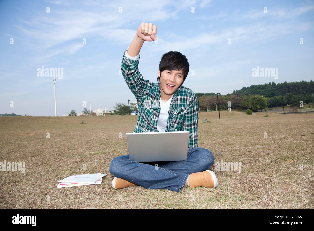 Young college students in a park outing Stock Photo - Alamy