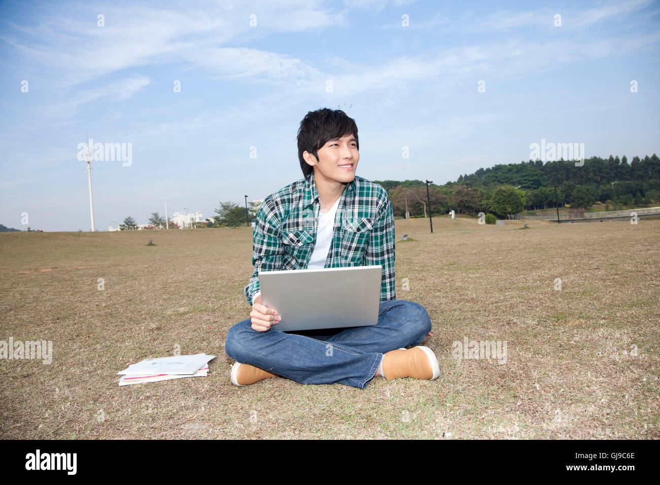 Young college students in a park outing Stock Photo - Alamy