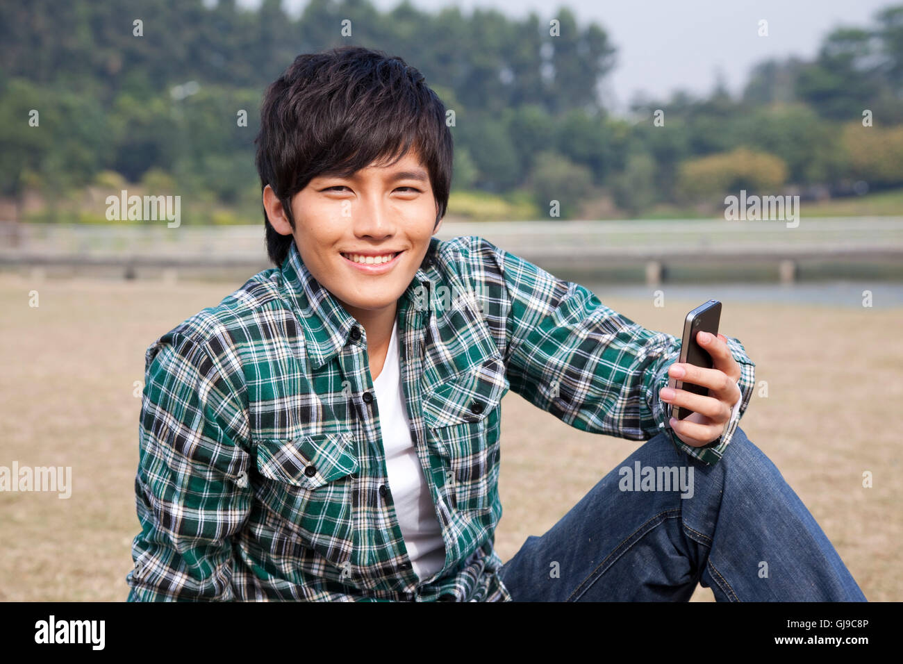 Young college students in a park outing Stock Photo - Alamy
