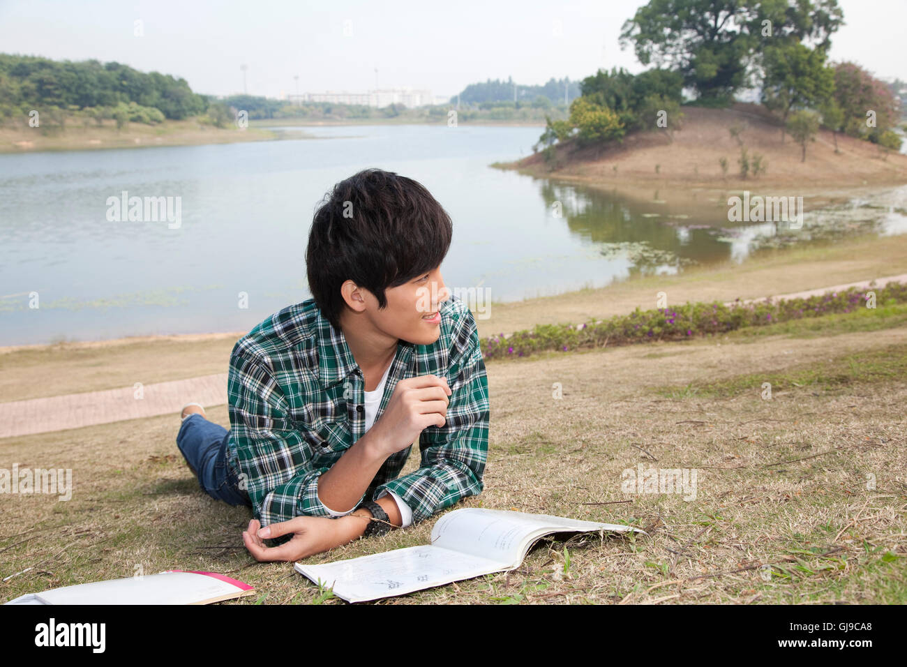 Young college students in a park outing Stock Photo - Alamy