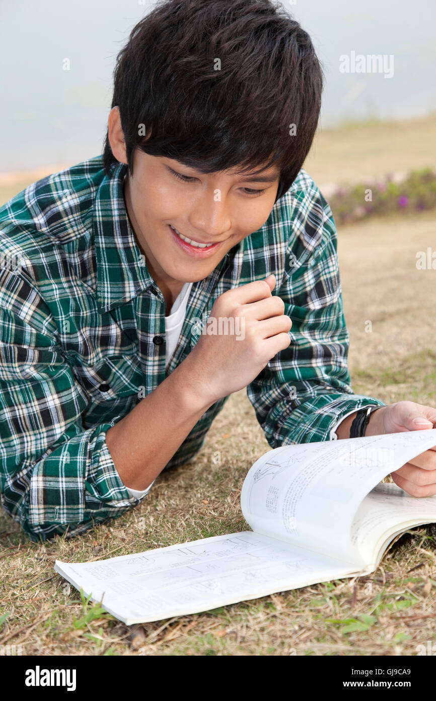 Young college students in a park outing Stock Photo - Alamy