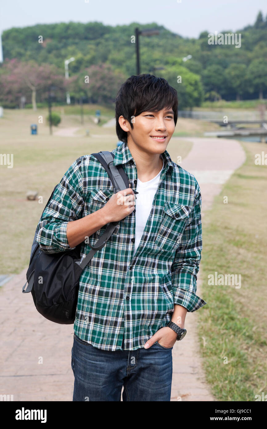 Young college students in a park outing Stock Photo - Alamy