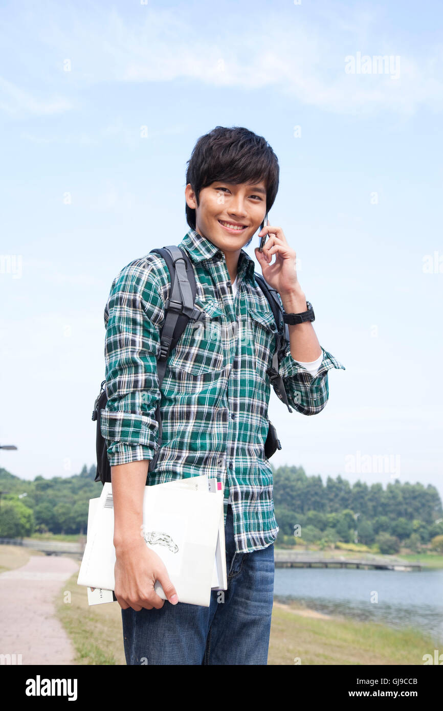 Young college students in a park outing Stock Photo - Alamy