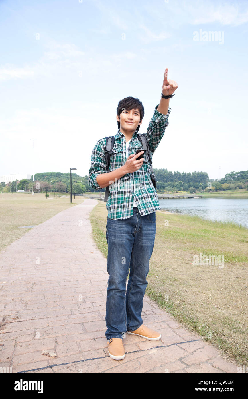 Young college students in a park outing Stock Photo - Alamy