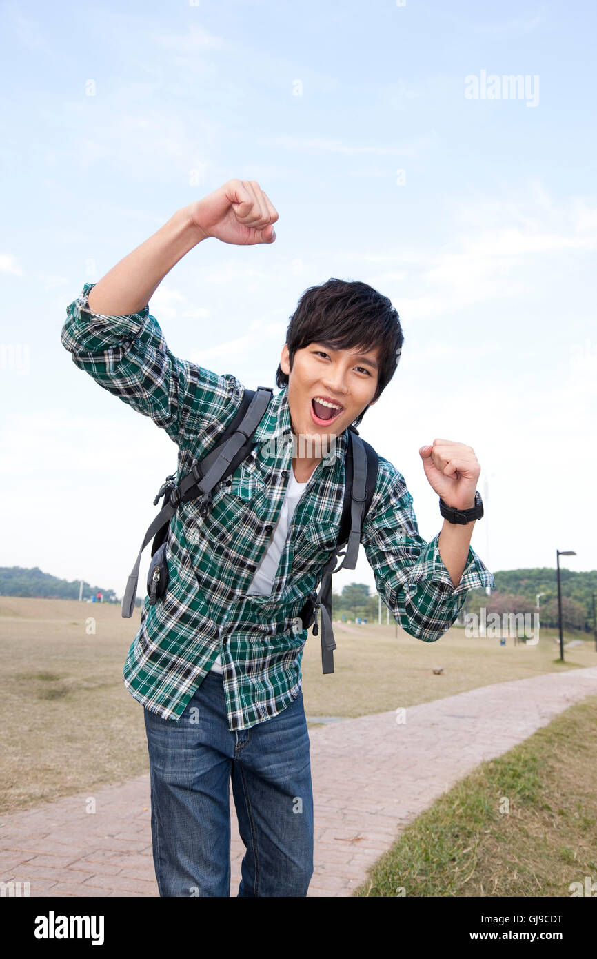 Young college students in a park outing Stock Photo - Alamy