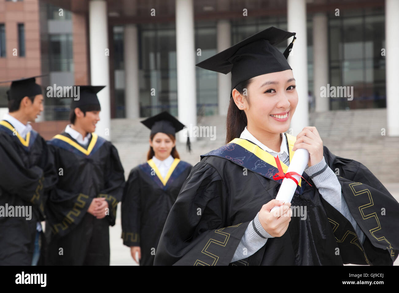 Young university student campus graduation ceremony Stock Photo - Alamy