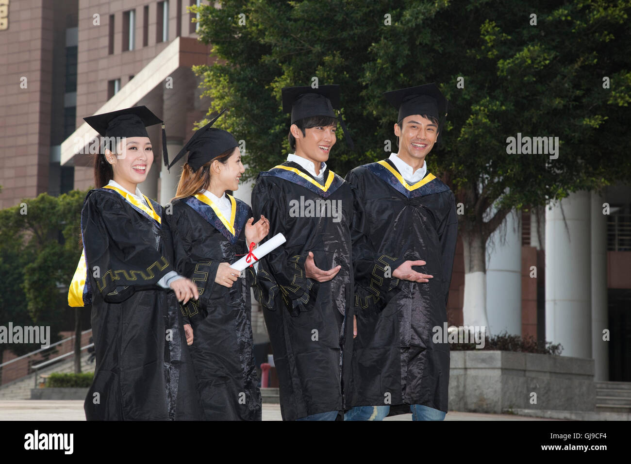 Young university student campus graduation ceremony Stock Photo - Alamy