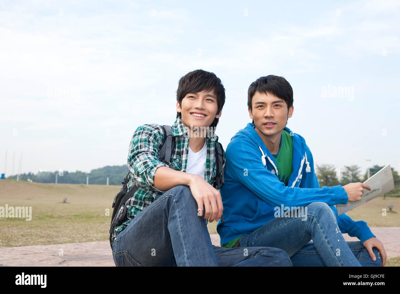 Young college students in a park outing Stock Photo - Alamy