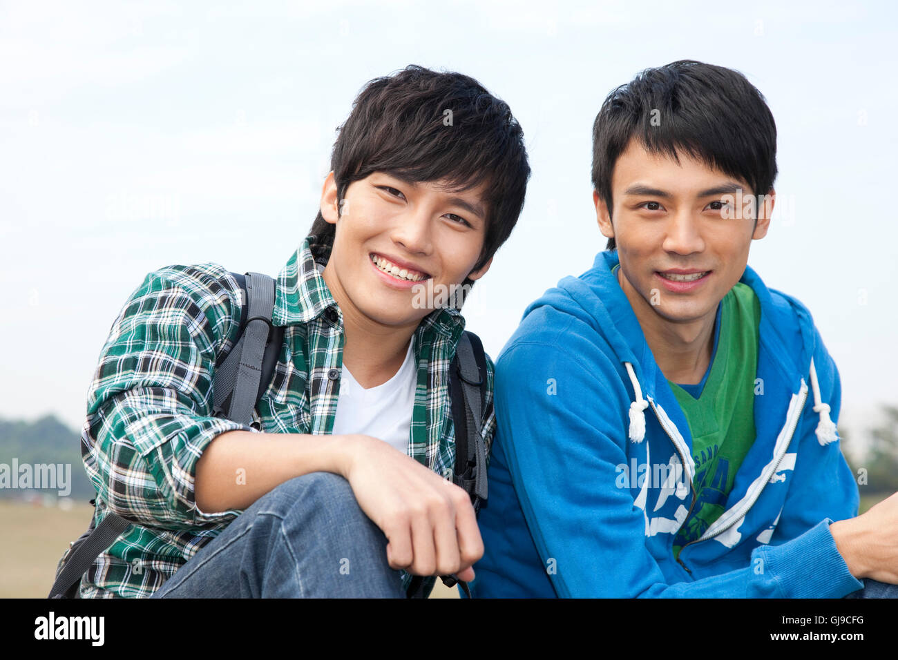 Young college students in a park outing Stock Photo - Alamy