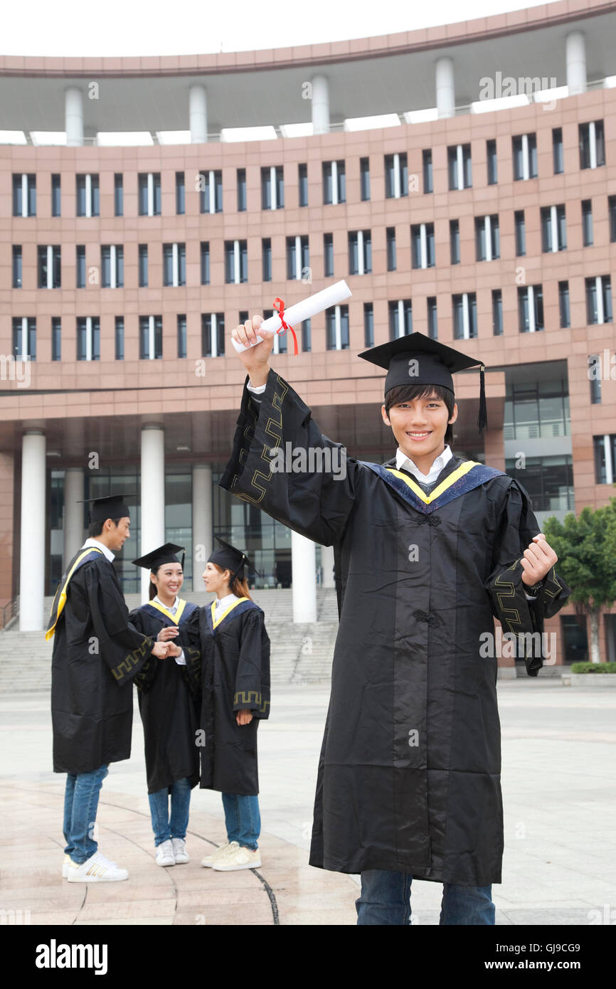 Young university student campus graduation ceremony Stock Photo - Alamy
