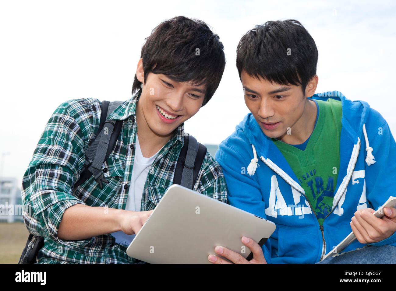 Young college students in a park outing Stock Photo - Alamy