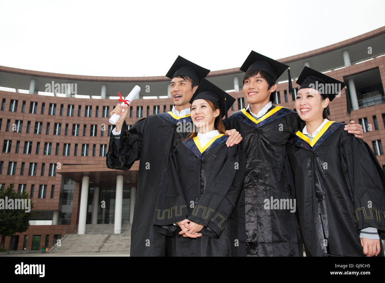 Young university student campus graduation ceremony Stock Photo - Alamy