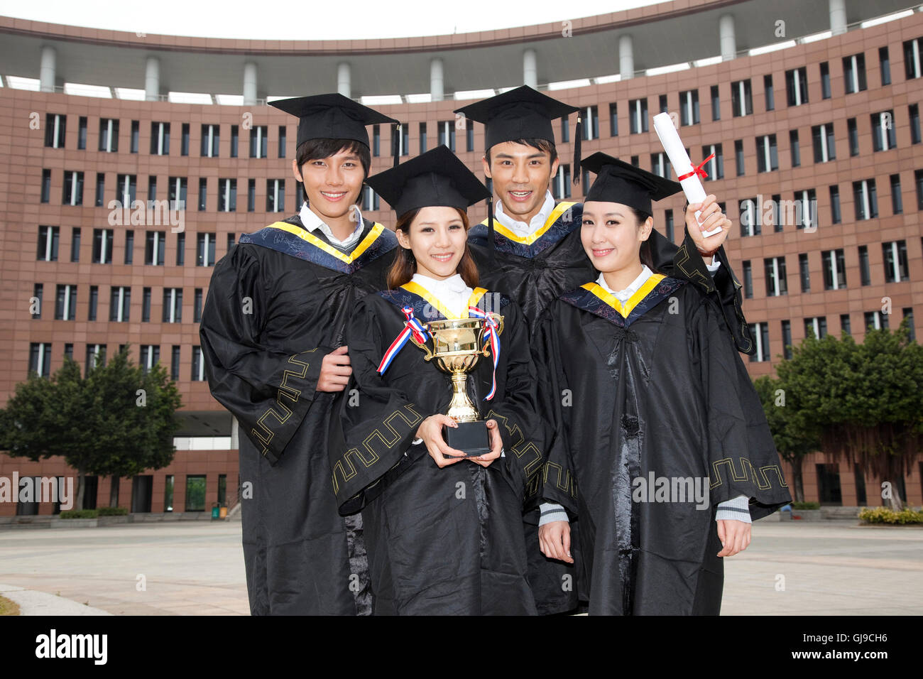 Young university student campus graduation ceremony Stock Photo - Alamy