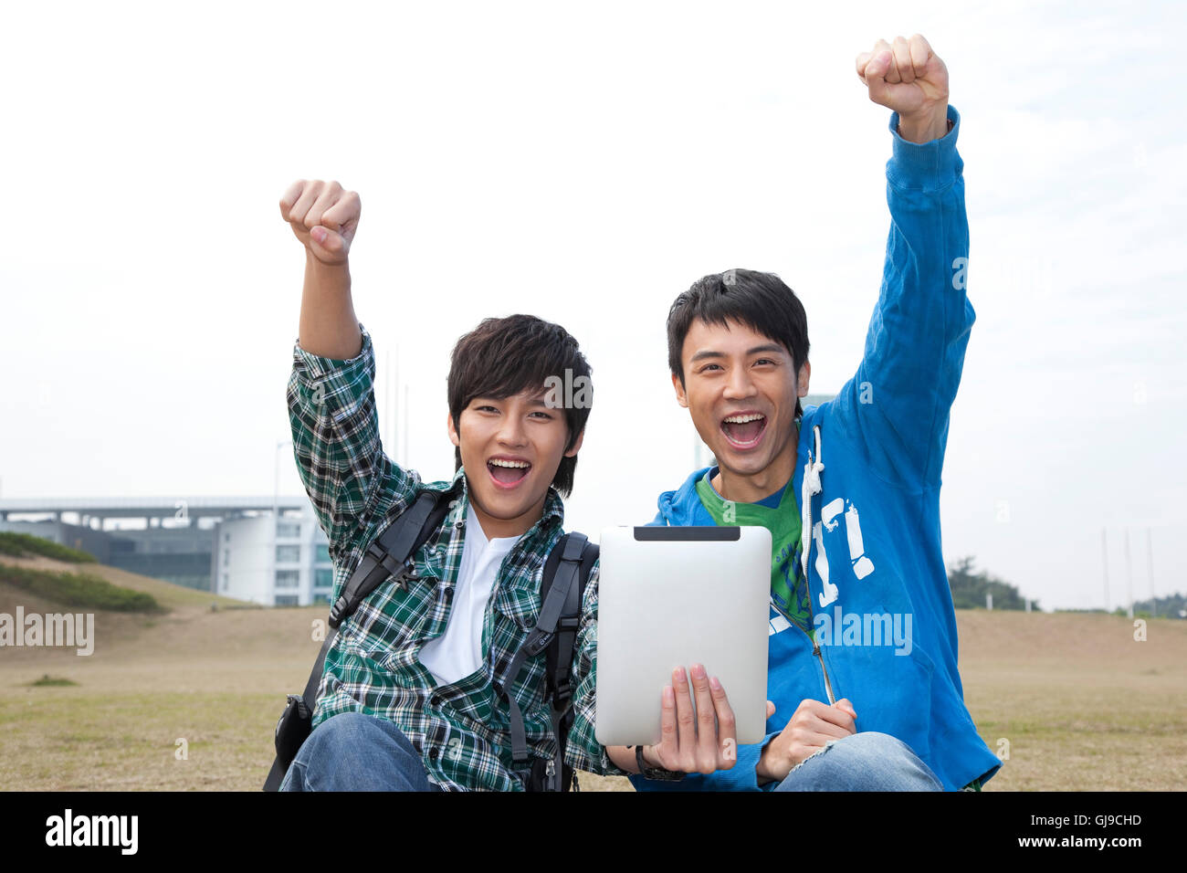 Young college students in a park outing Stock Photo - Alamy