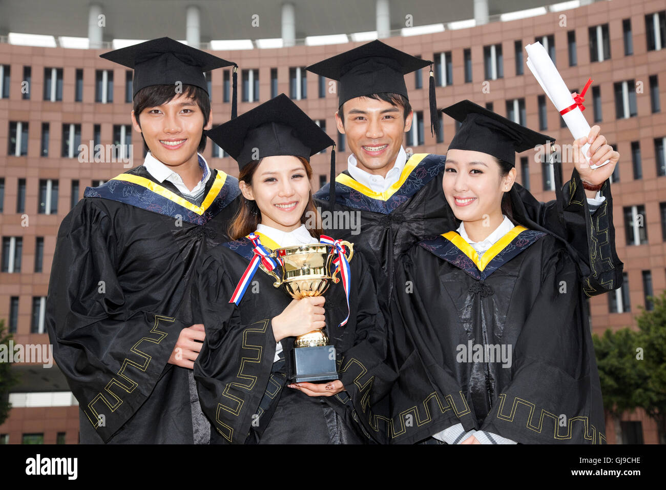 Young university student campus graduation ceremony Stock Photo - Alamy