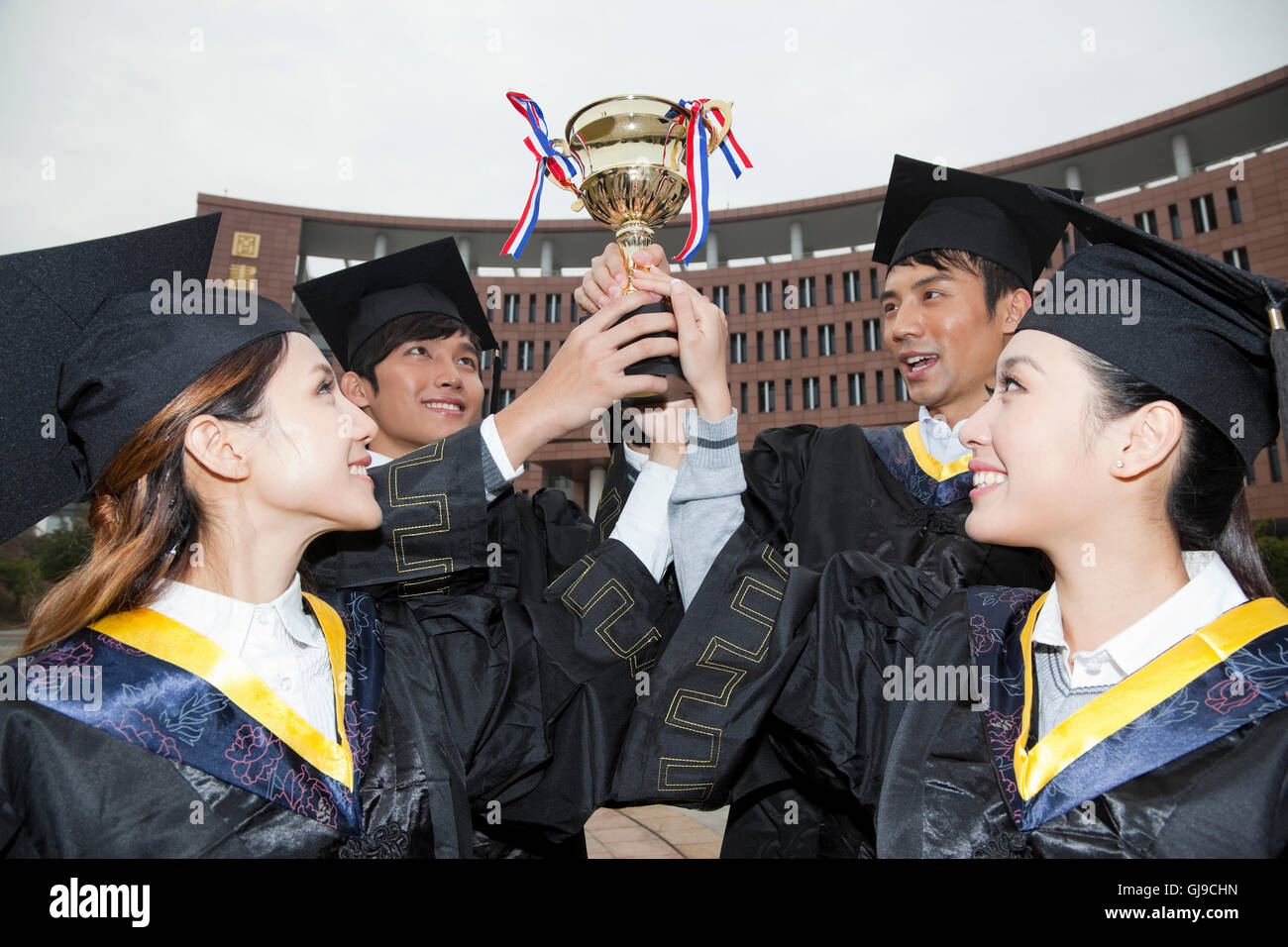 Young university student campus graduation ceremony Stock Photo - Alamy
