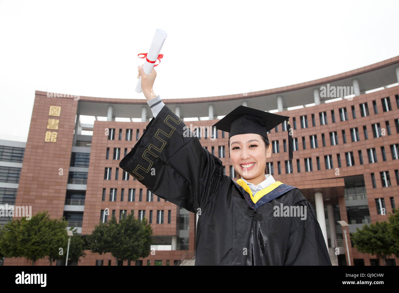 Young university student campus graduation ceremony Stock Photo - Alamy