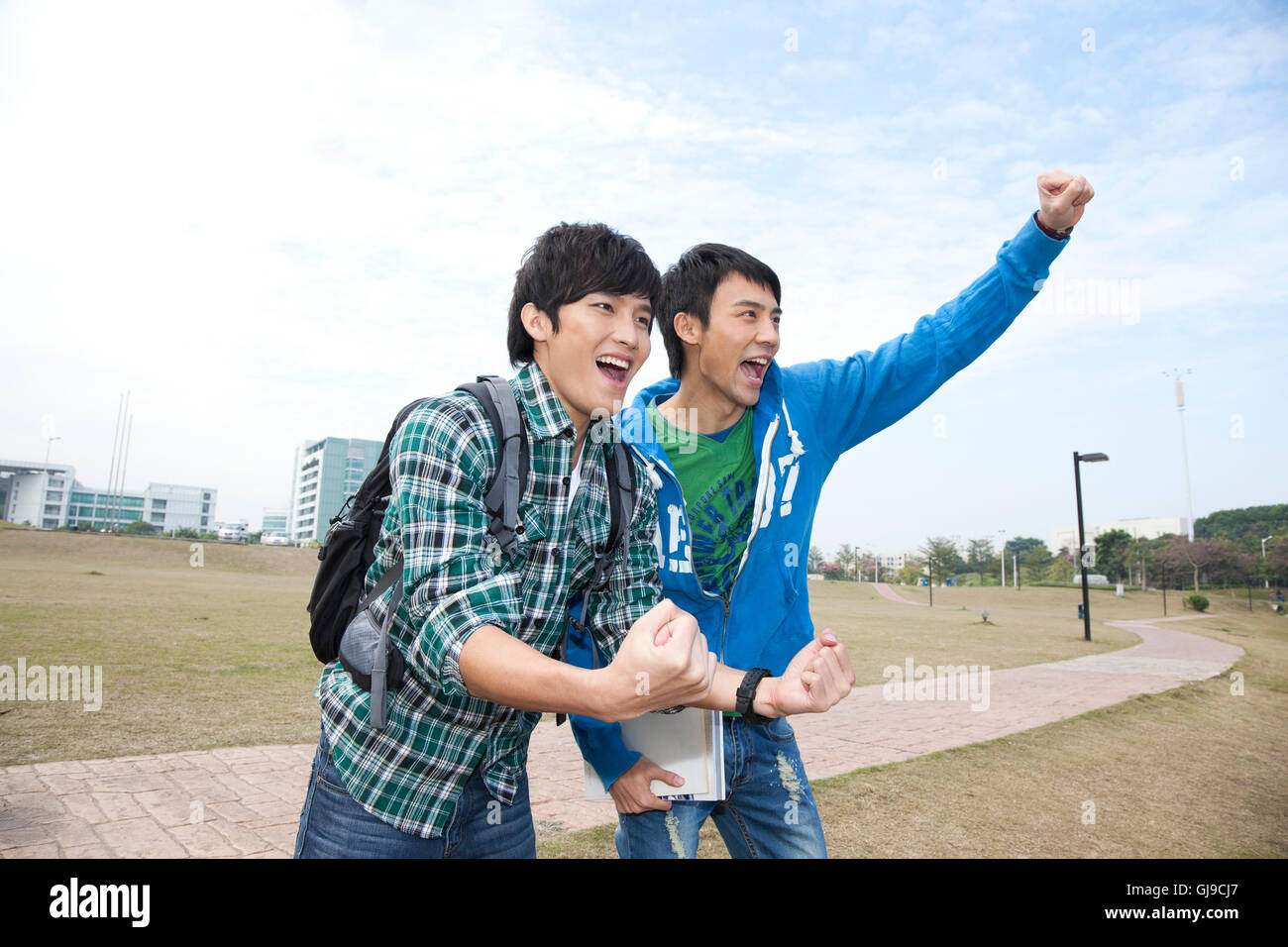 Young college students in a park outing Stock Photo - Alamy