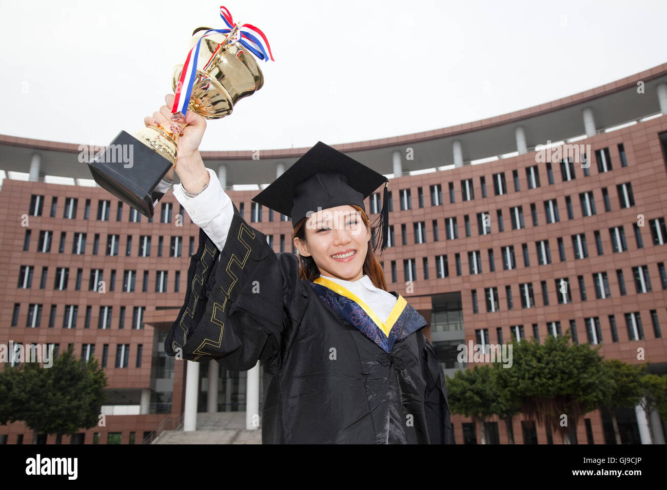 Young university student campus graduation ceremony Stock Photo - Alamy