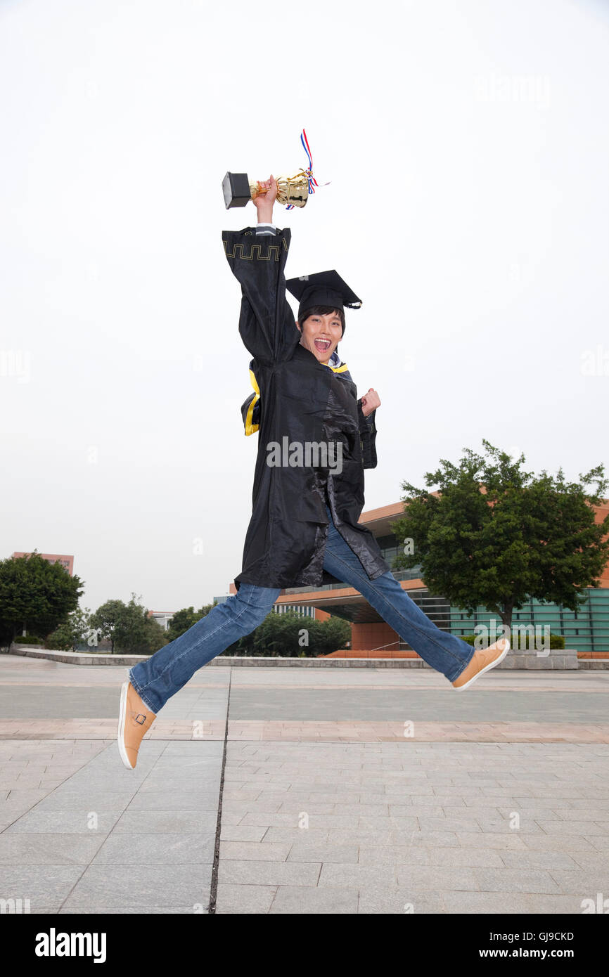 Young university student campus graduation ceremony Stock Photo - Alamy