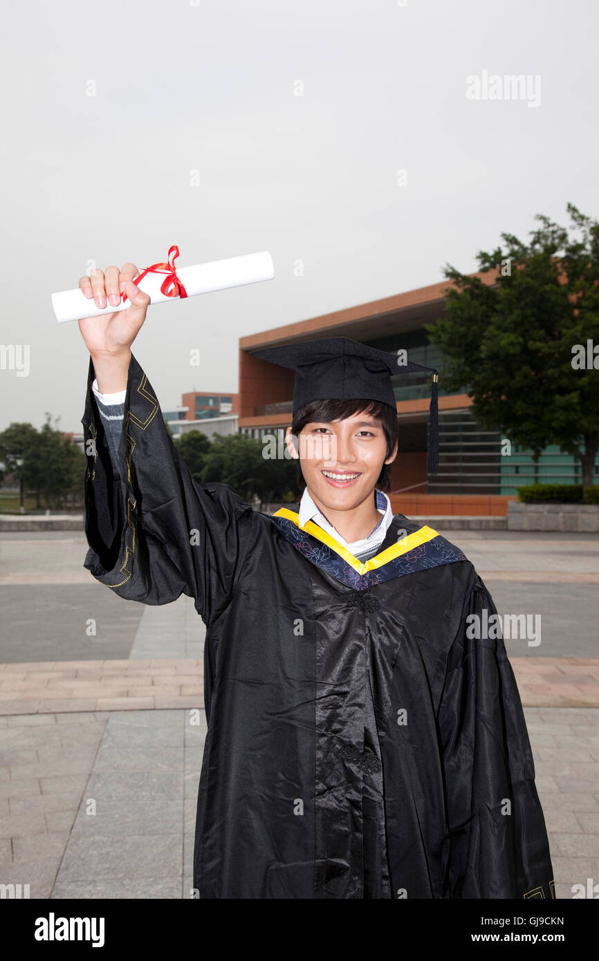Young university student campus graduation ceremony Stock Photo - Alamy