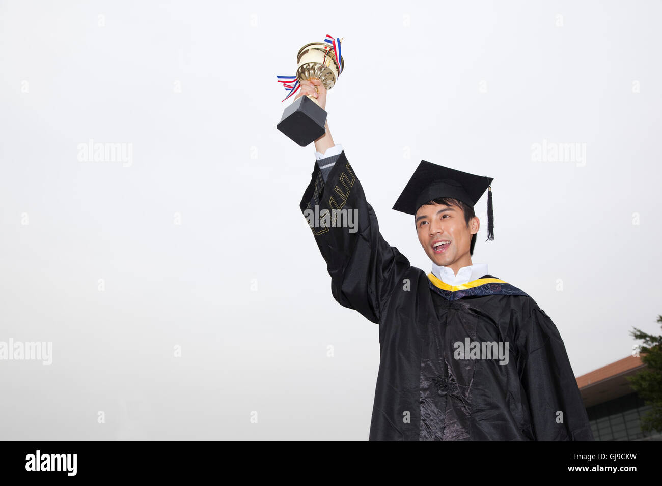 Young university student campus graduation ceremony Stock Photo - Alamy