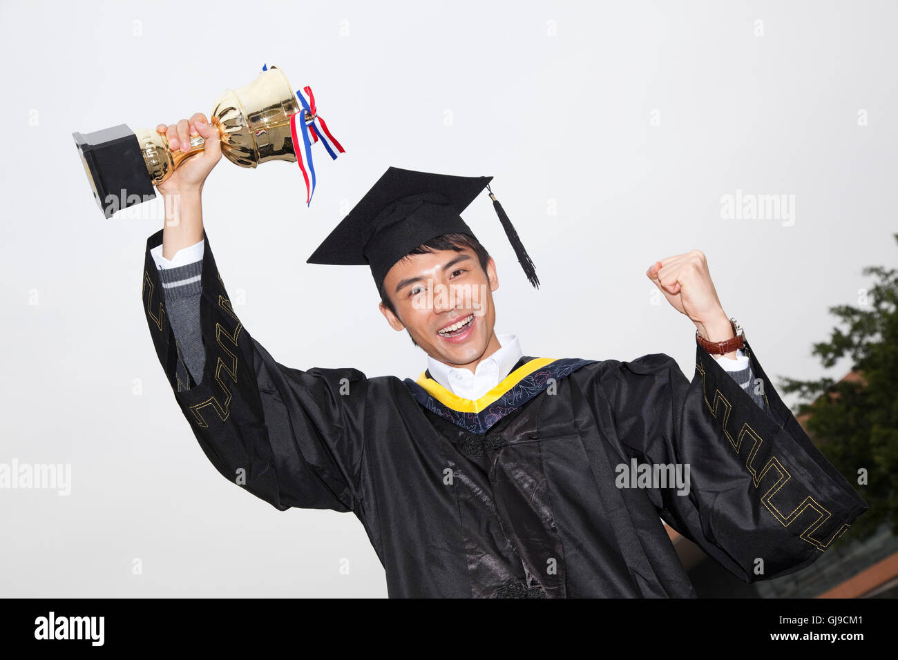 Young university student campus graduation ceremony Stock Photo - Alamy