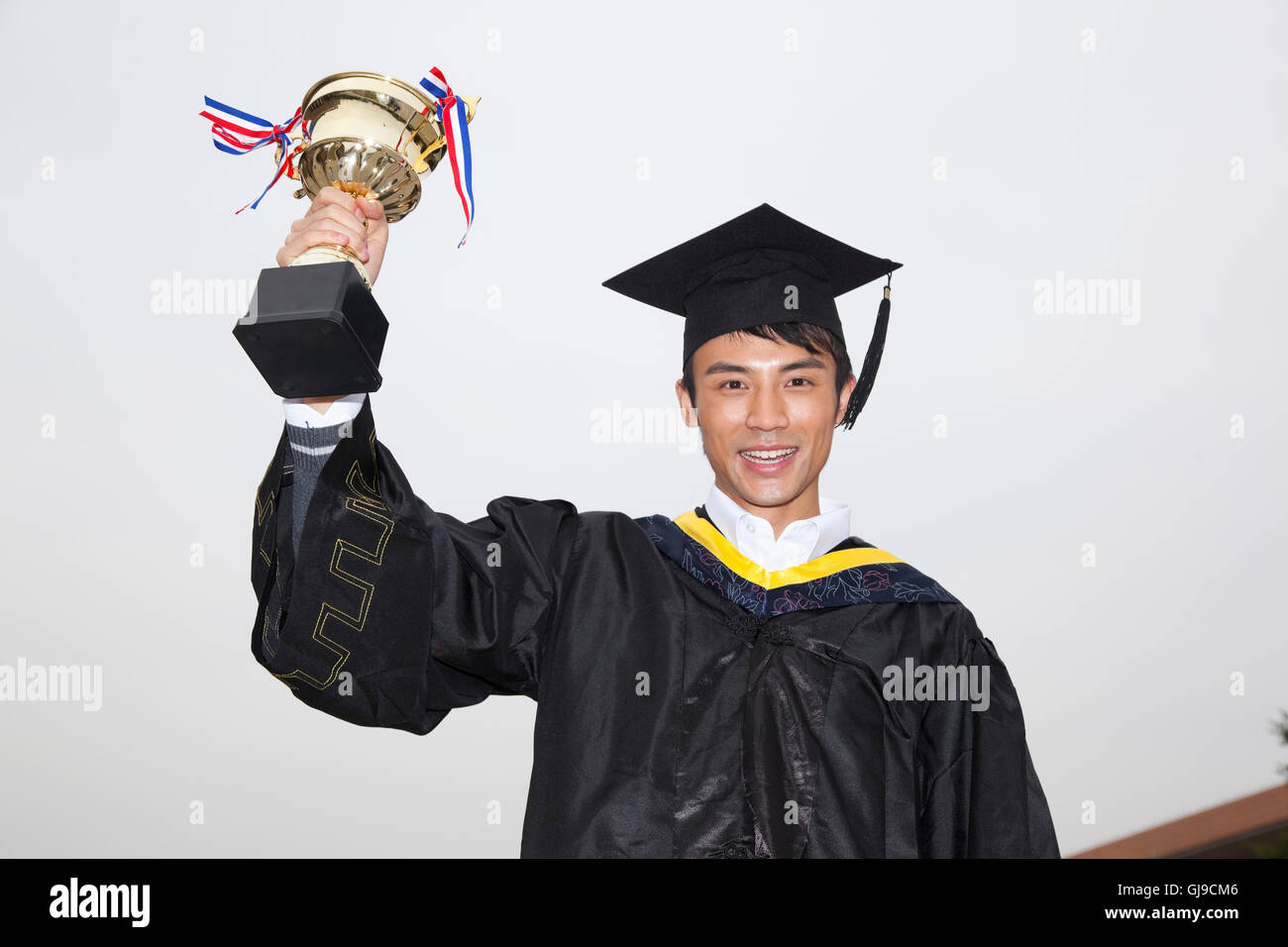 Young university student campus graduation ceremony Stock Photo - Alamy