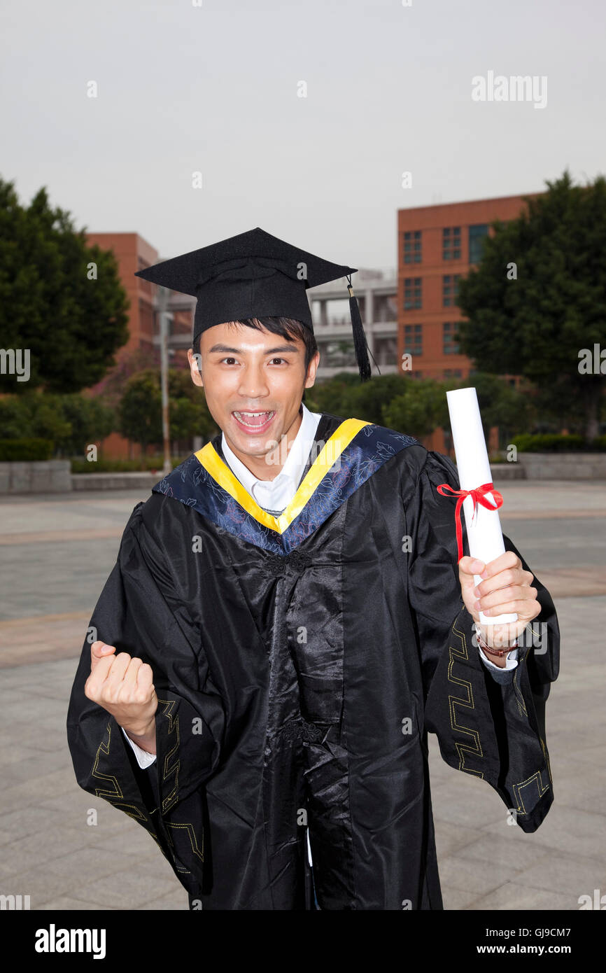 Young university student campus graduation ceremony Stock Photo - Alamy