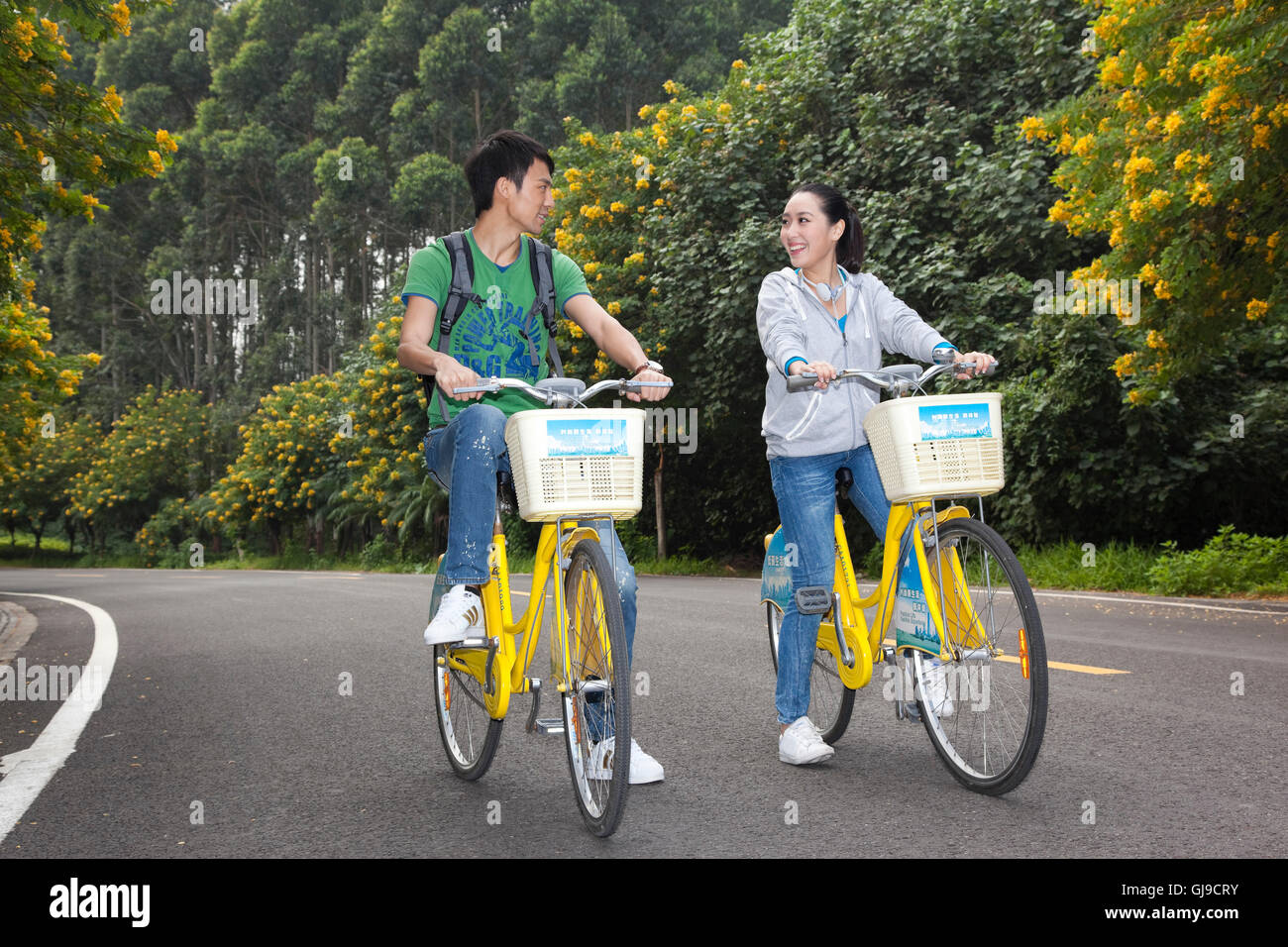 Young university student campus cycling Stock Photo - Alamy