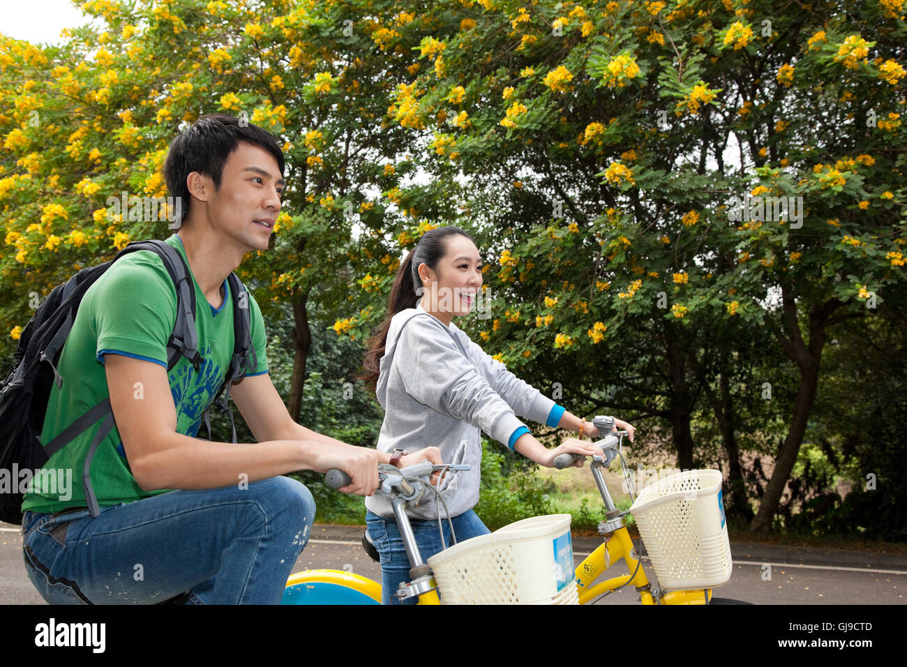 Young university student campus cycling Stock Photo - Alamy