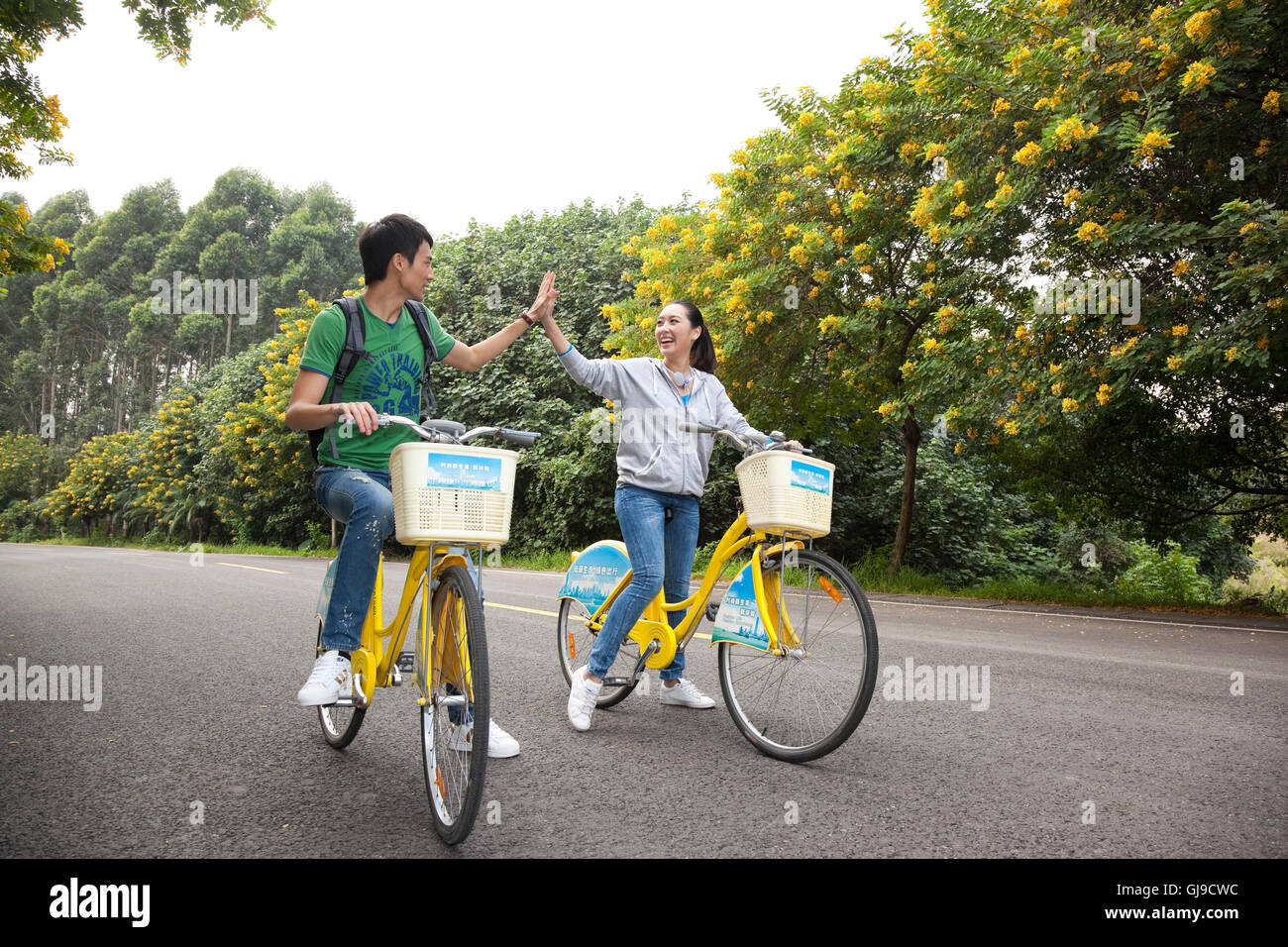 Young university student campus cycling Stock Photo - Alamy