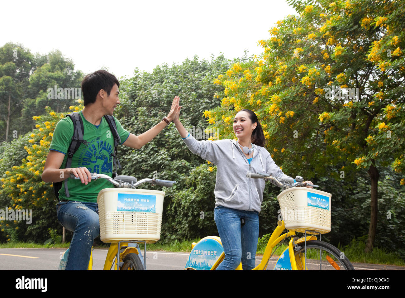 Young university student campus cycling Stock Photo - Alamy