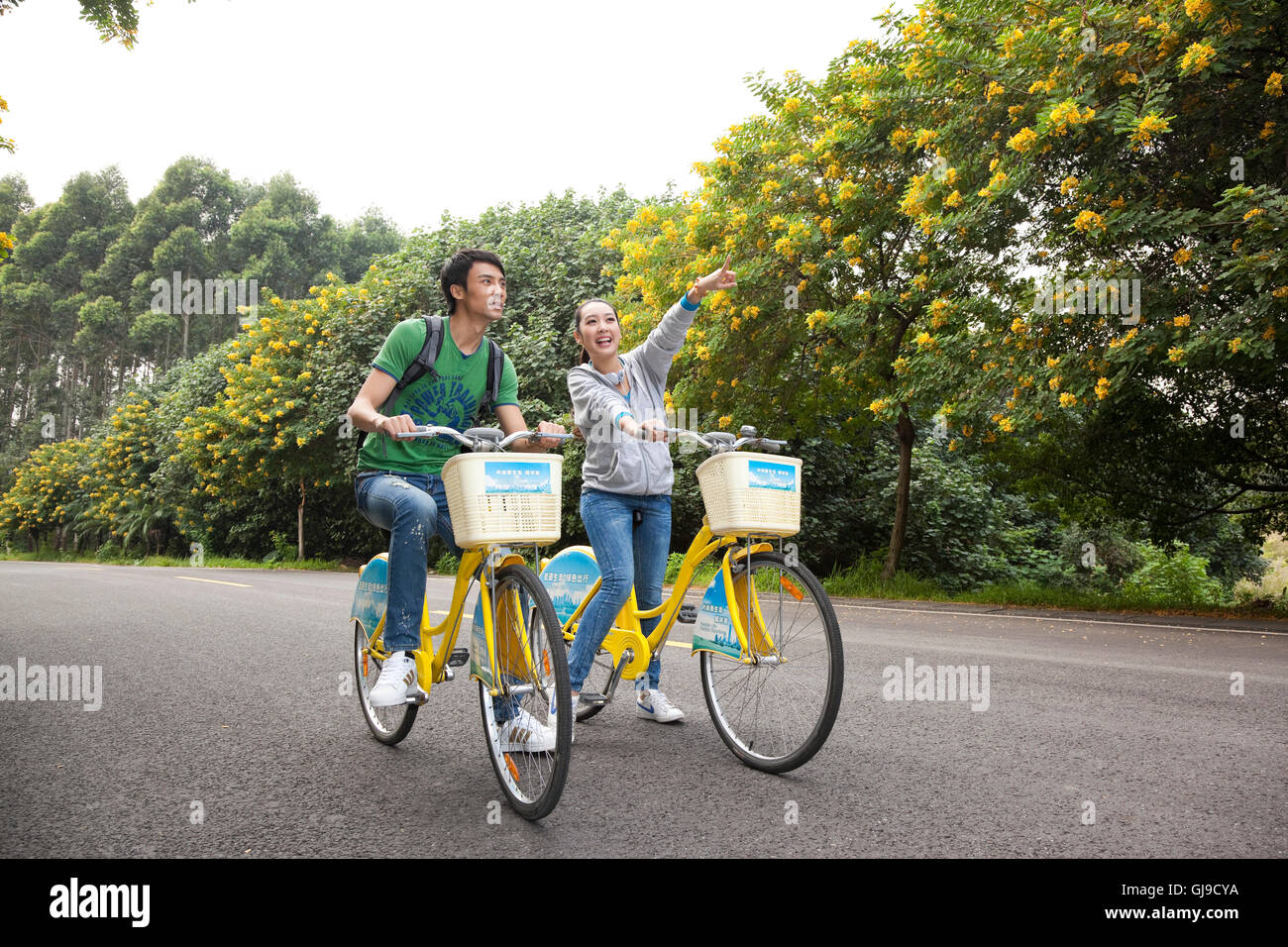 Young university student campus cycling Stock Photo - Alamy
