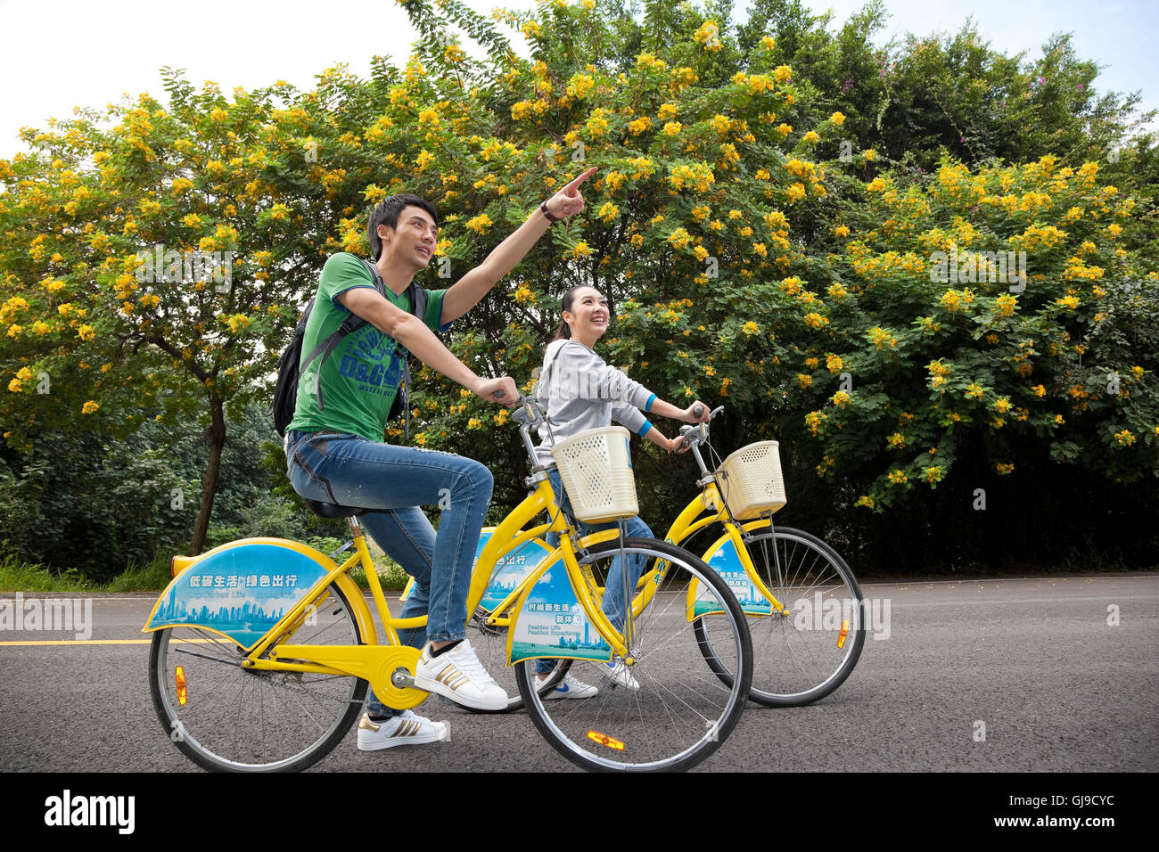 Young university student campus cycling Stock Photo - Alamy