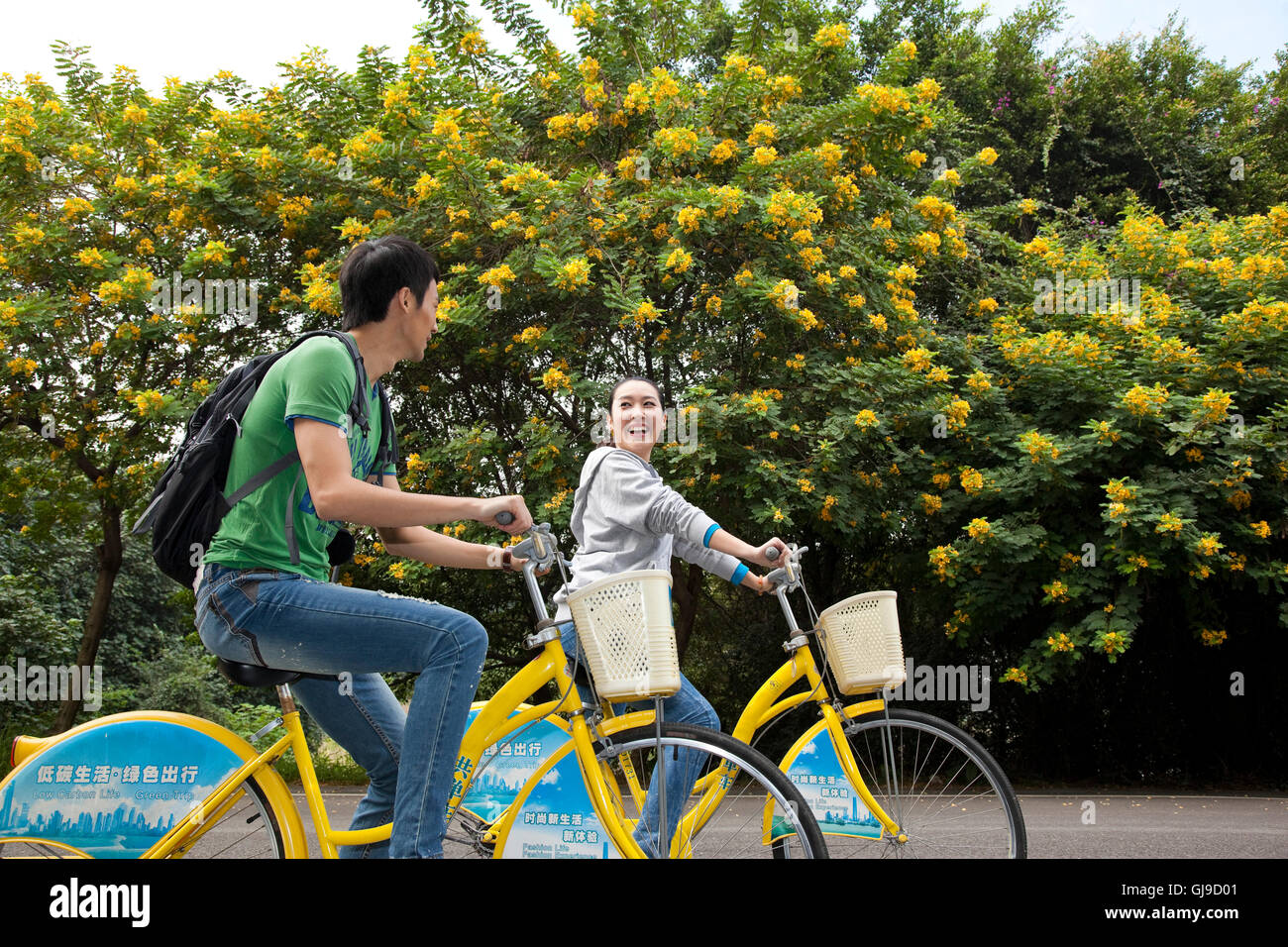 Young university student campus cycling Stock Photo - Alamy
