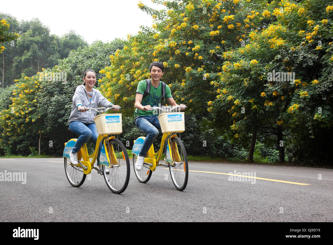 Young university student campus cycling Stock Photo - Alamy